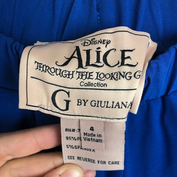 Disney | Pants & Jumpsuits | Disney Alice In Wonderland Blue Skinny ...